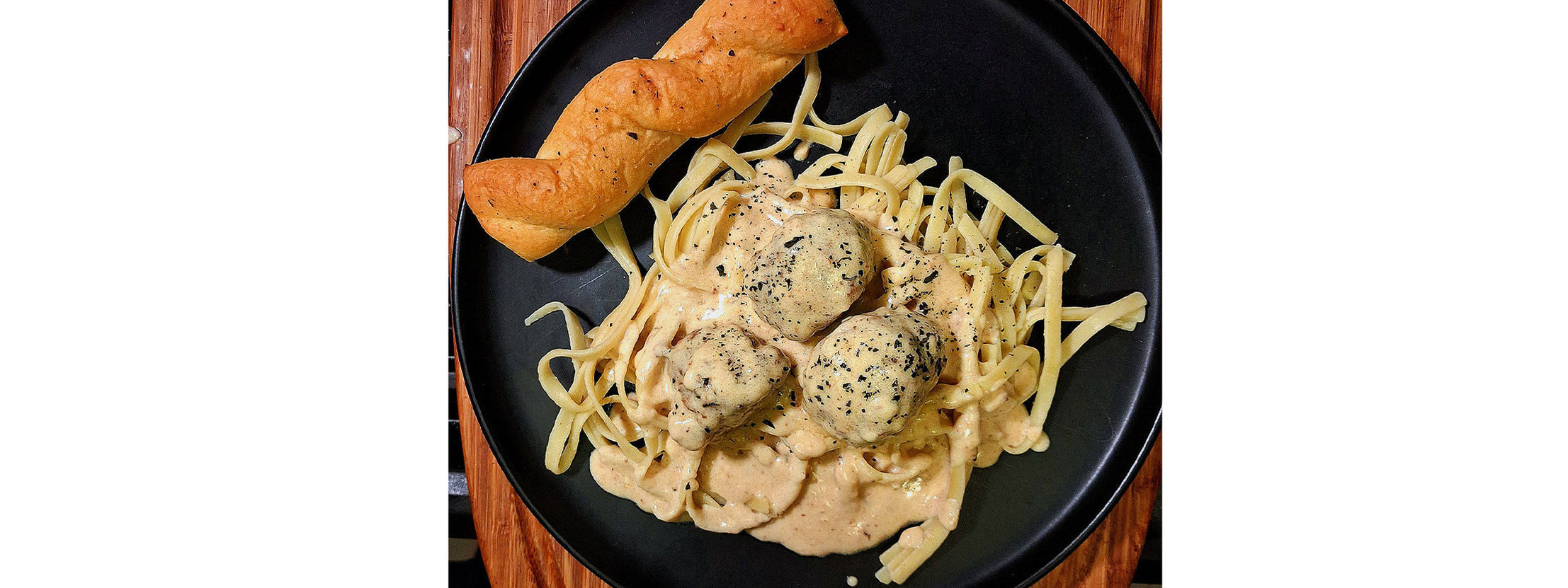 Creamy Garlic Parmesan Chicken Meatballs (Feathered Feast Version)